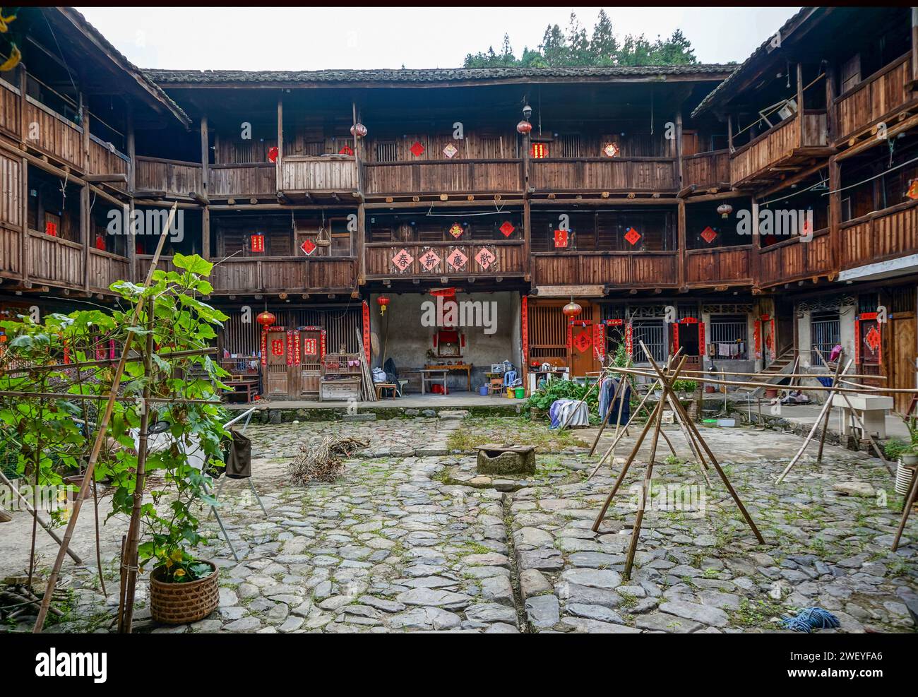 Rectangular and round Hakka Tulou (building made of rammed earth and ...