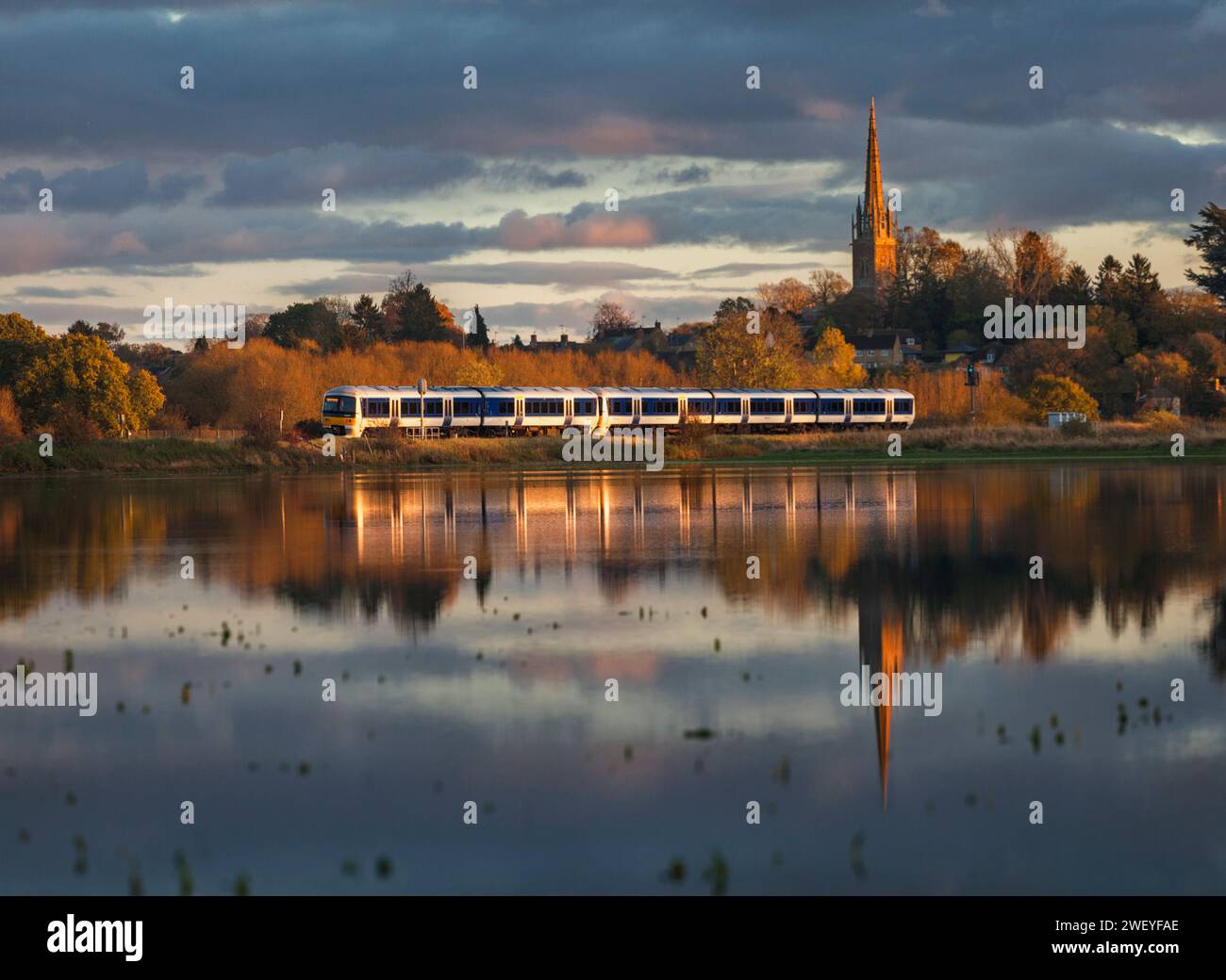 Chiltern Railways class 165 Turbo train reflected in the flooded fields ...