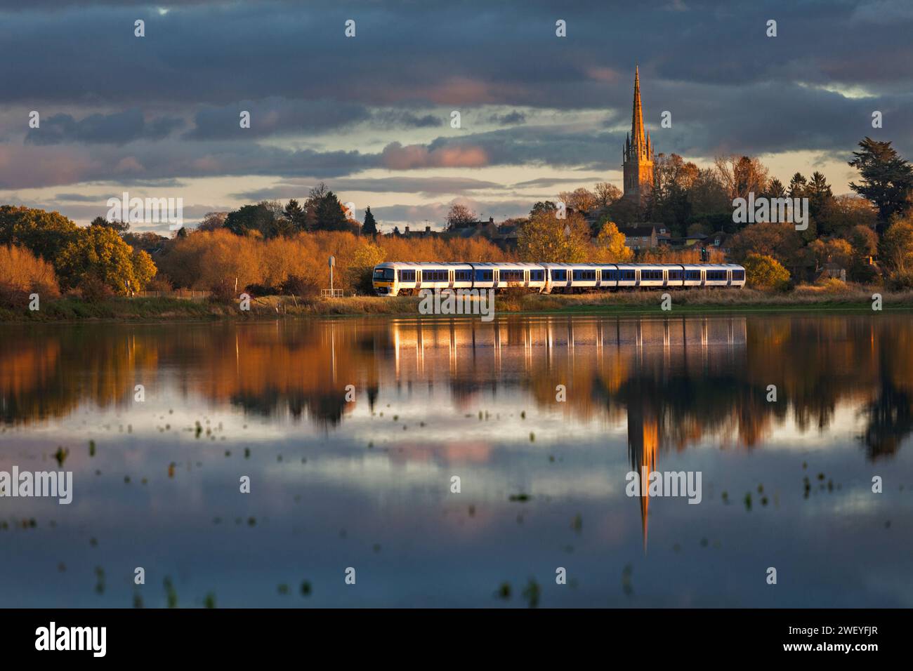 Chiltern Railways class 165 Turbo train reflected in the flooded fields ...