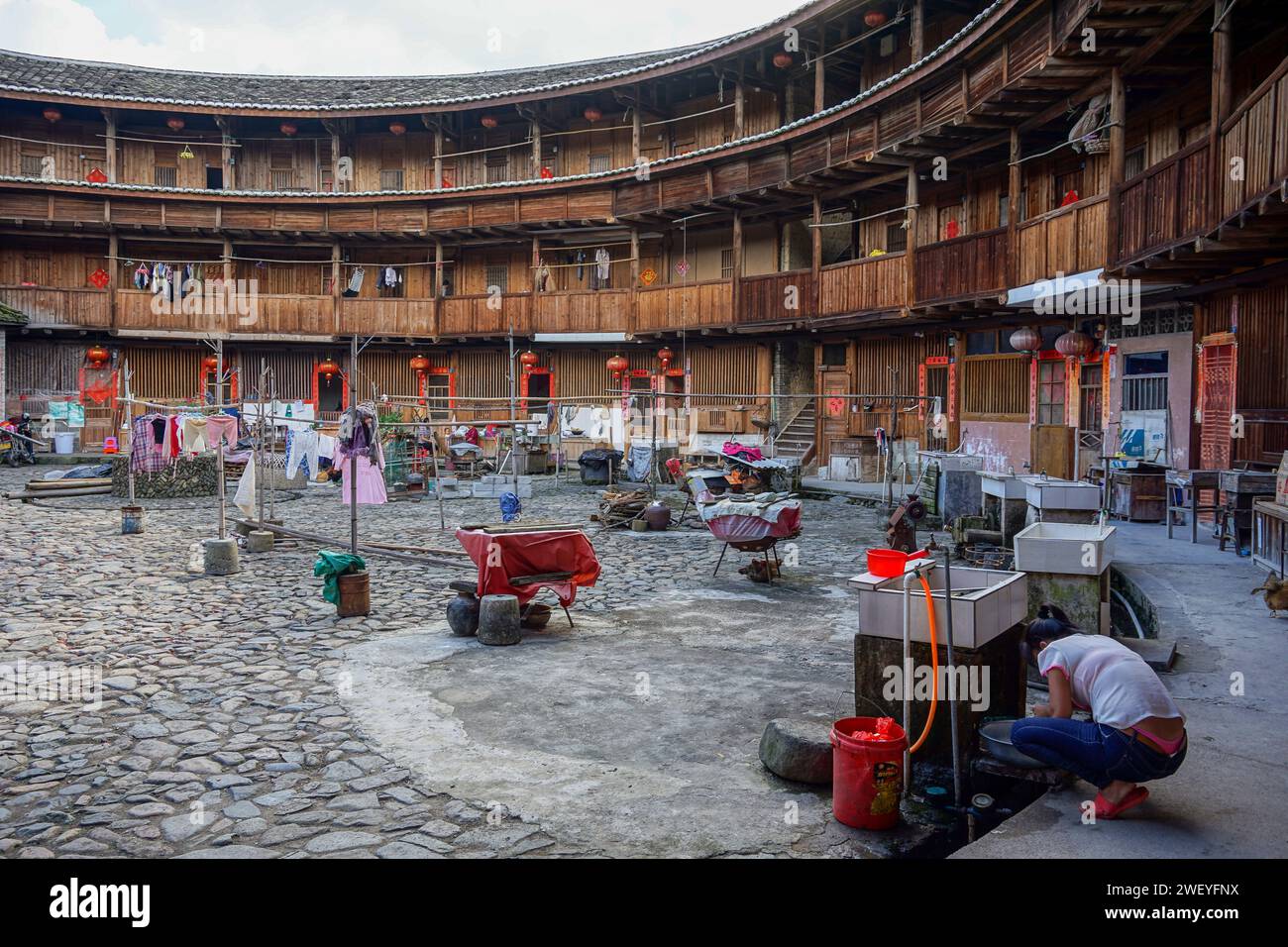 Rectangular and round Hakka Tulou (building made of rammed earth and ...
