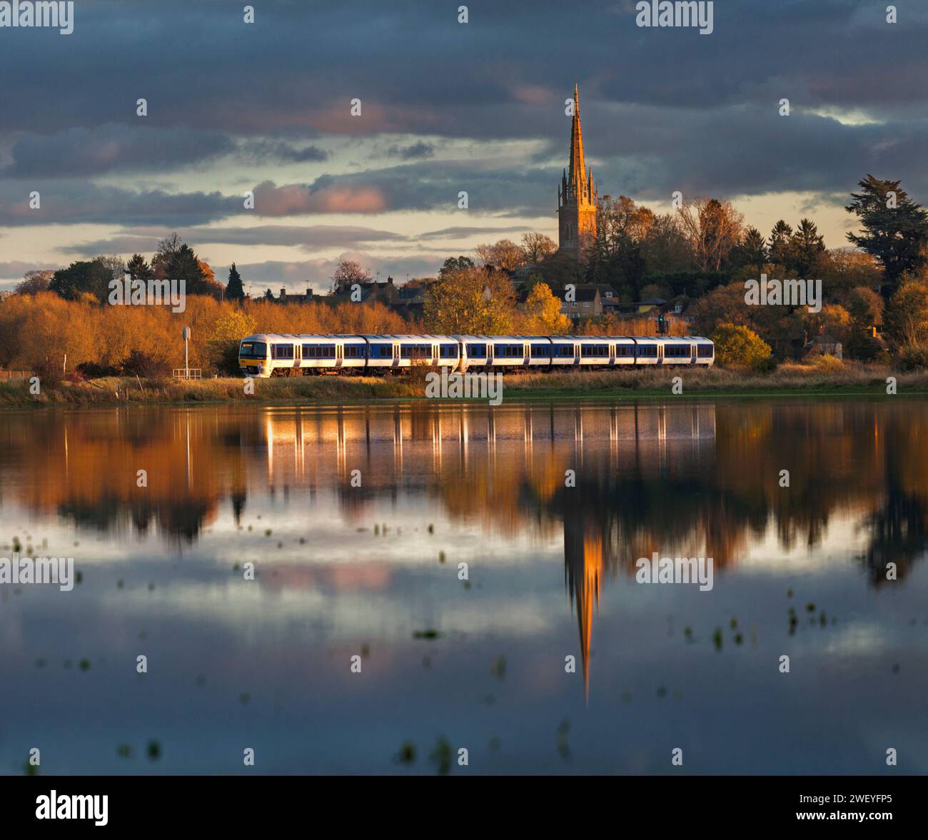 Chiltern Railways class 165 Turbo train reflected in the flooded fields ...
