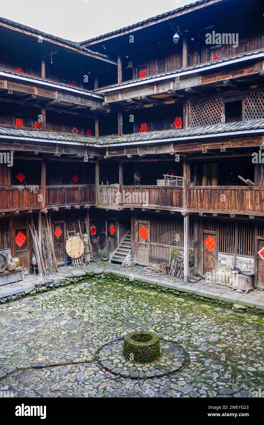 Rectangular and round Hakka Tulou (building made of rammed earth and ...