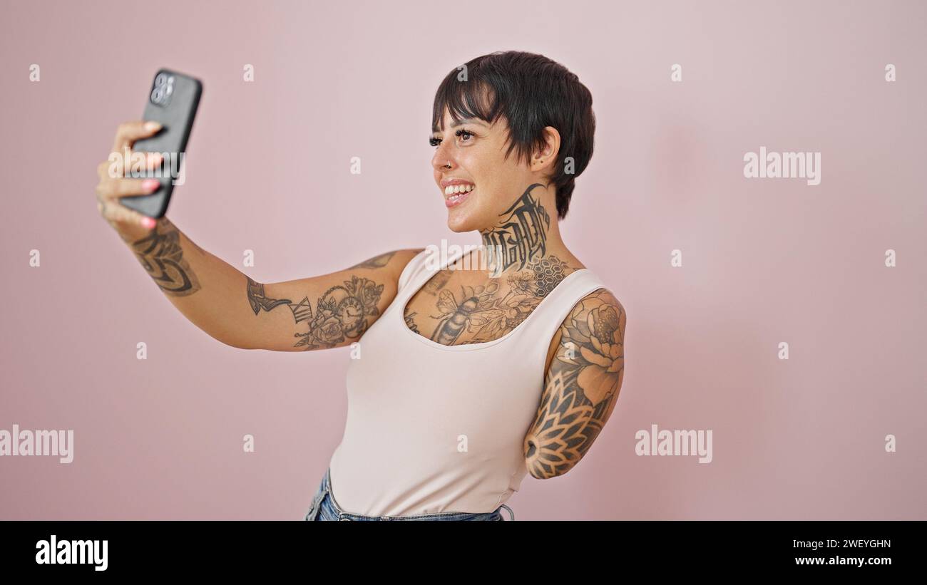 Hispanic woman with amputee arm smiling confident having video call ...