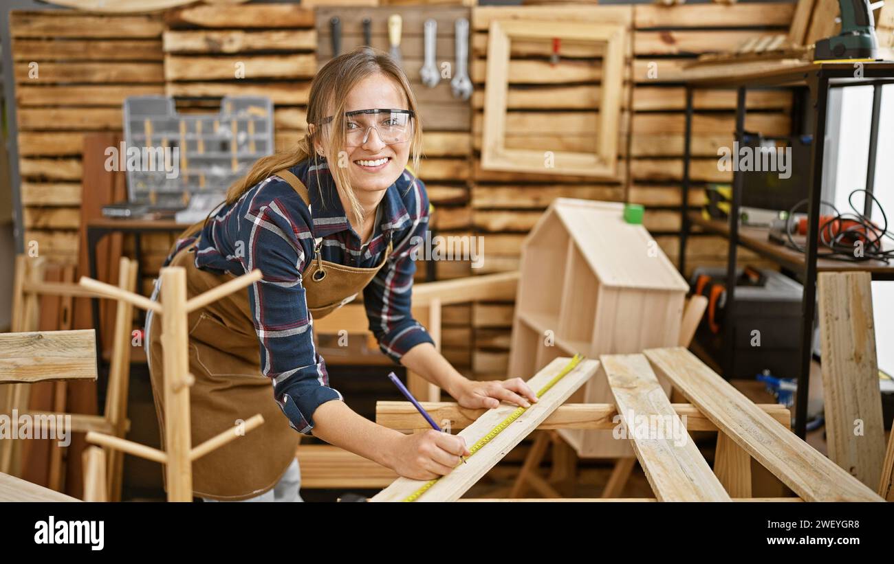 Female construction worker standing proudly hi-res stock photography ...