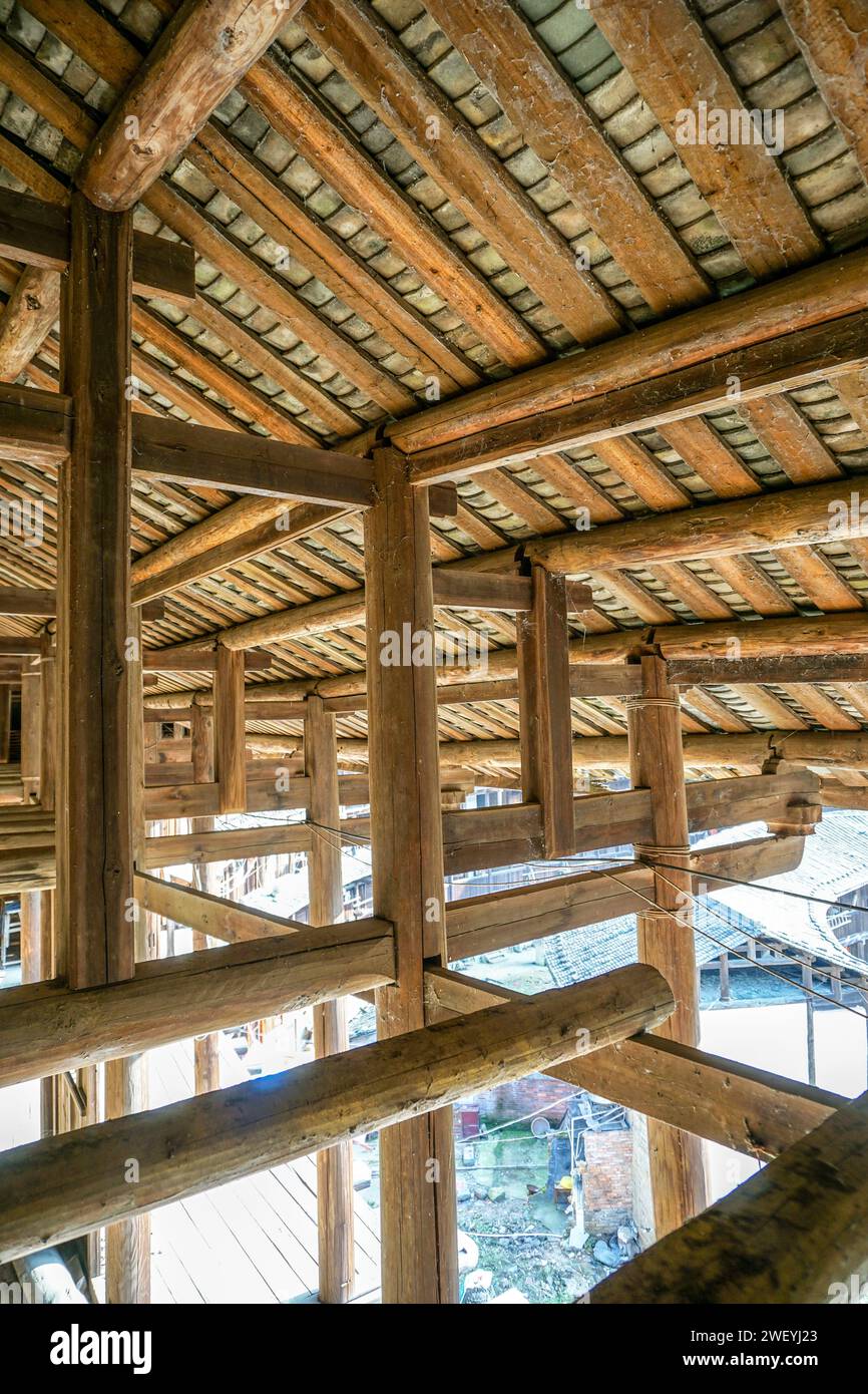 timber roof construction of Shunyu Lou, one of the largest tulou ...