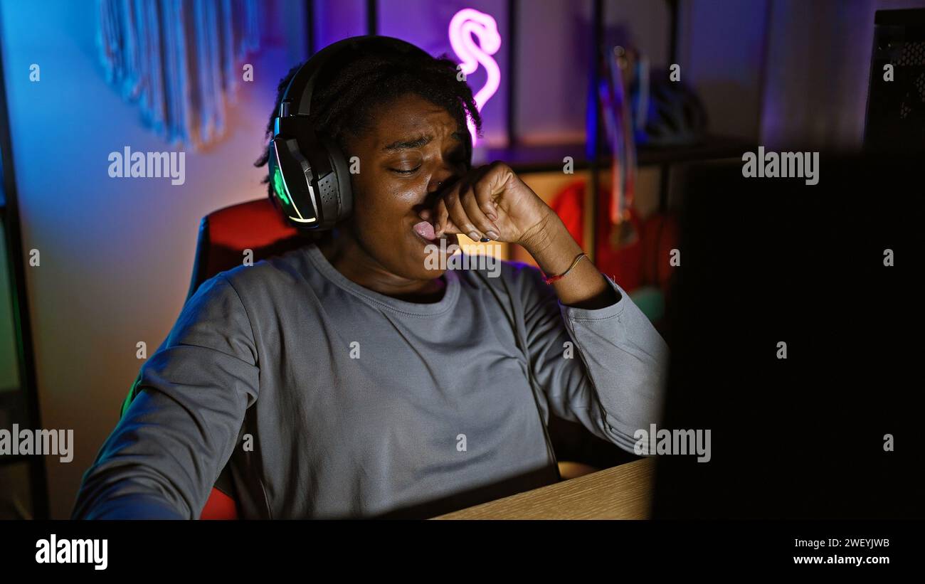 Tired gamer in rgb hi-res stock photography and images - Alamy