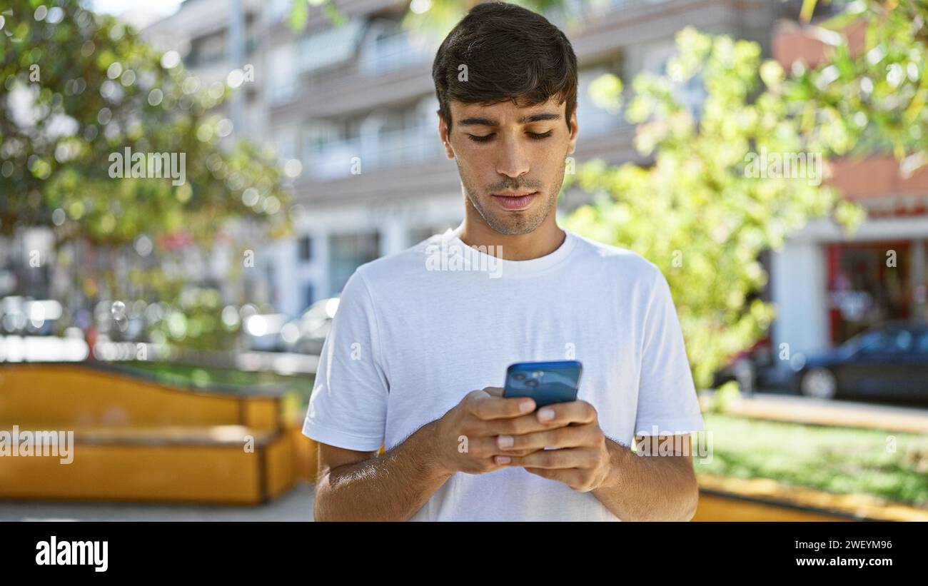 Cool looking young hispanic man, with serious expression, deeply ...