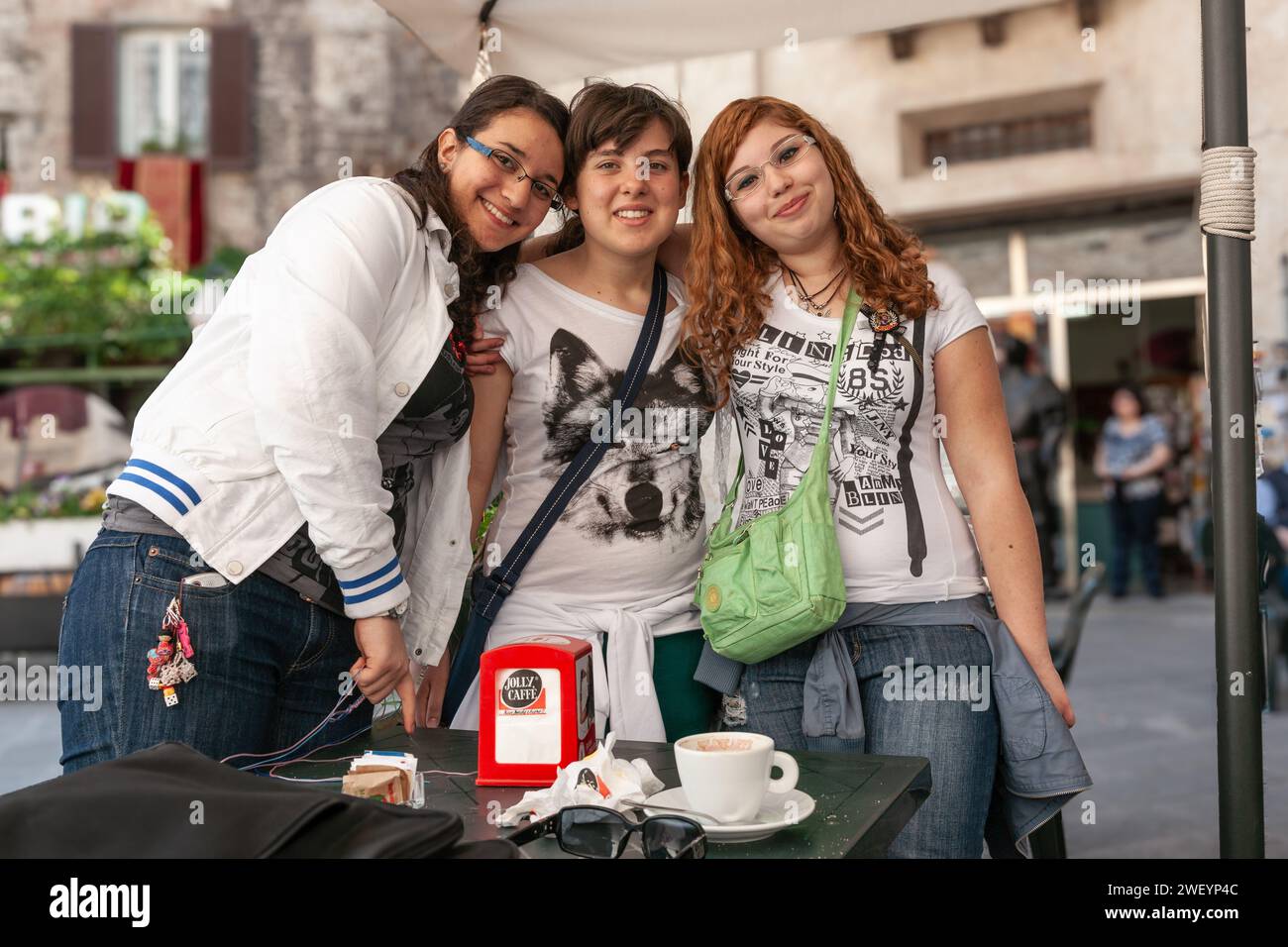 Gubbio Italy - May 13 2011; typical group of three young women casually ...