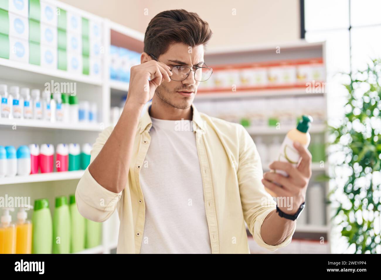Reading label of shampoo hi-res stock photography and images - Alamy