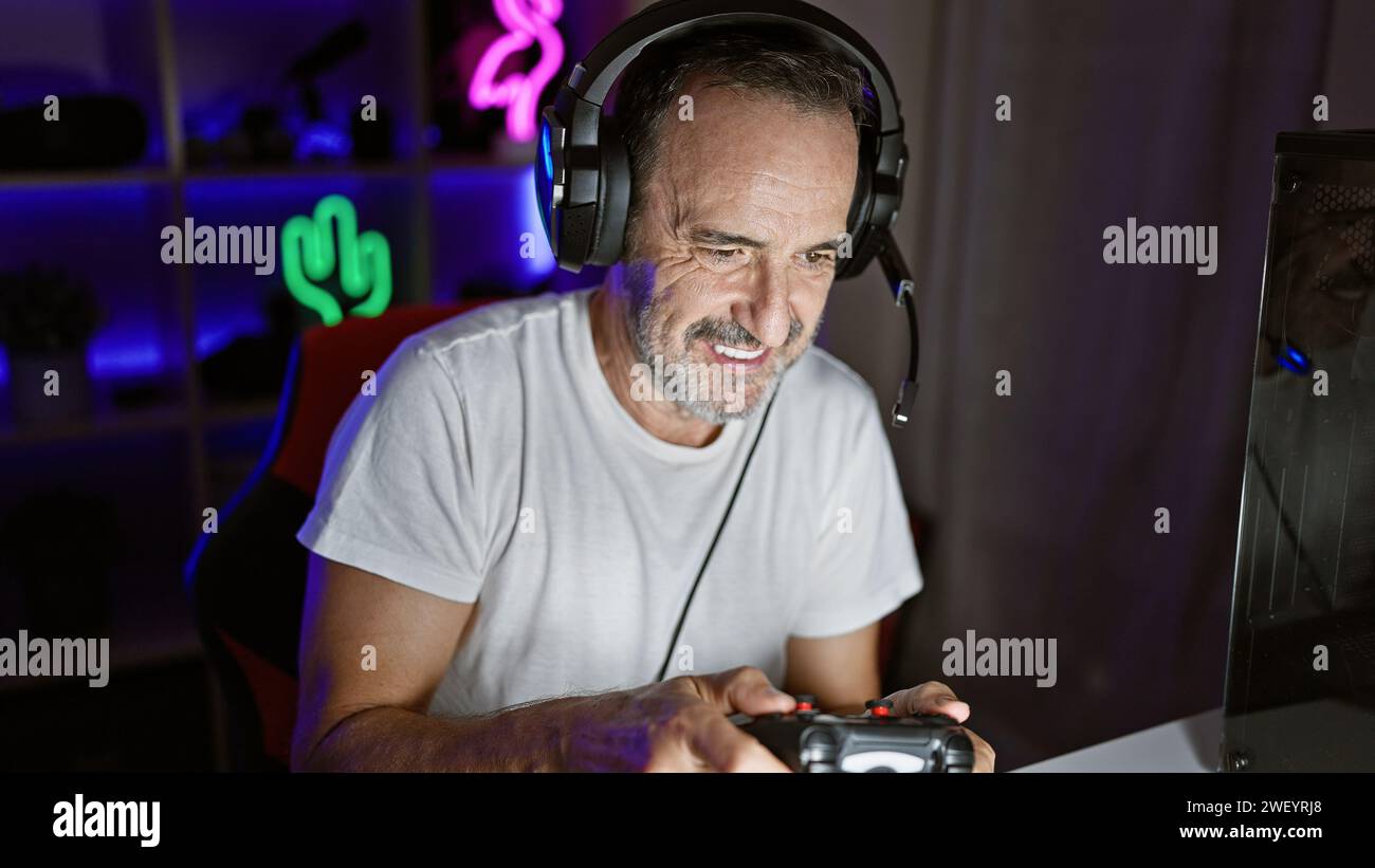 Emotive stream of middle age man with grey hair, rocking the gaming ...