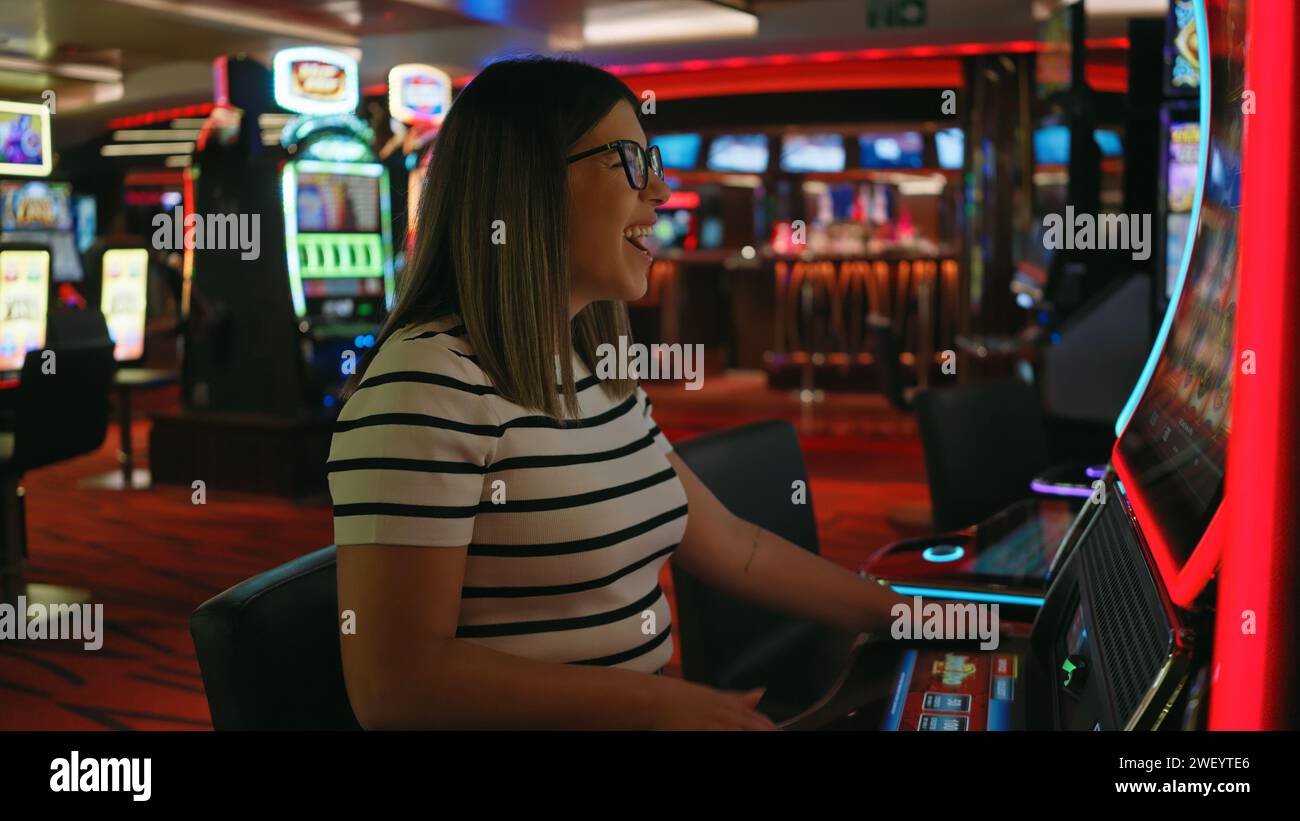 Woman in eyeglasses playing game hi-res stock photography and images ...