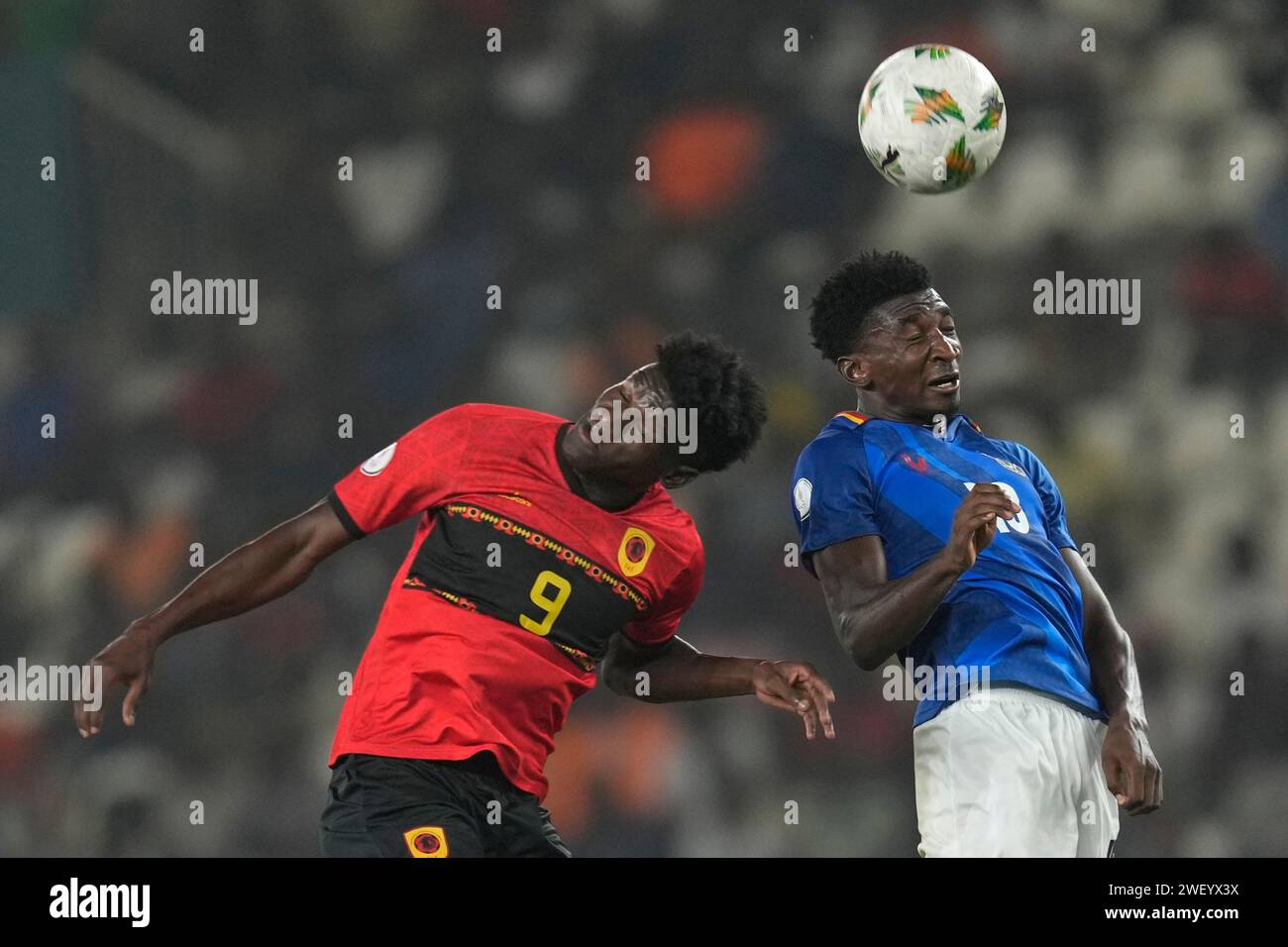 Angola's Ambrosini Salvador, heads the ball past Namibia's Aprocius ...