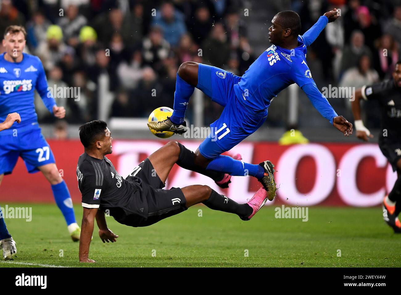 Turin, Italy. 27th Jan, 2024. Alex Sandro of Juventus FC and Emmanuel ...