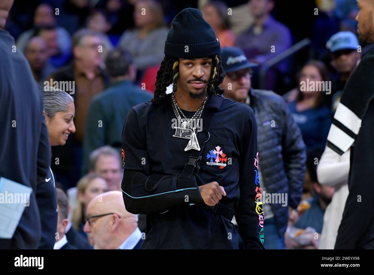 Memphis Grizzlies guard Ja Morant (12) stands on the sideline in the ...