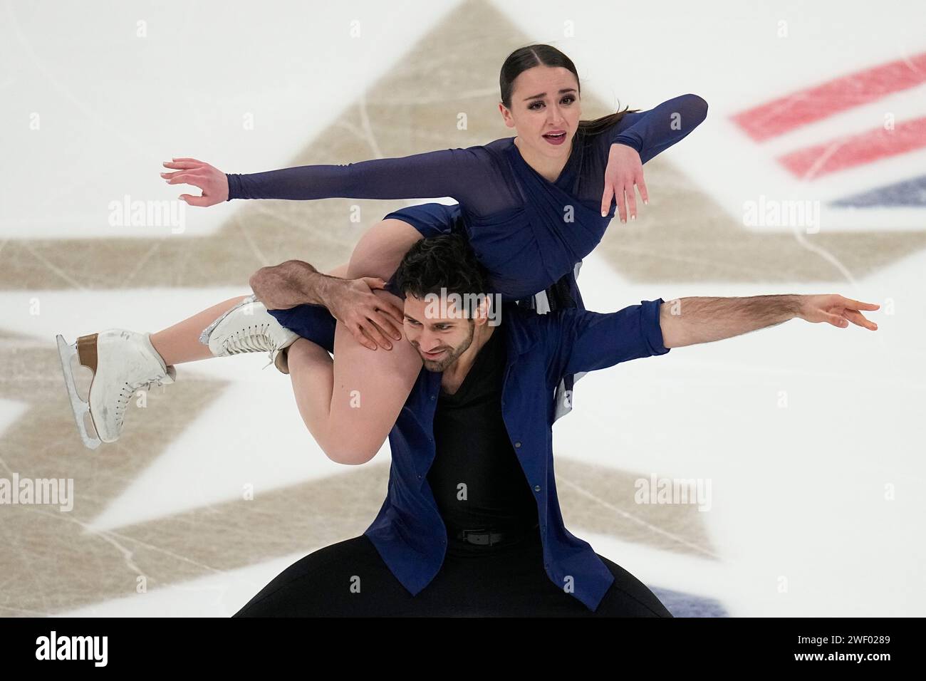 Cara Murphy and Joshua Levitt compete in championship ice dance at the ...