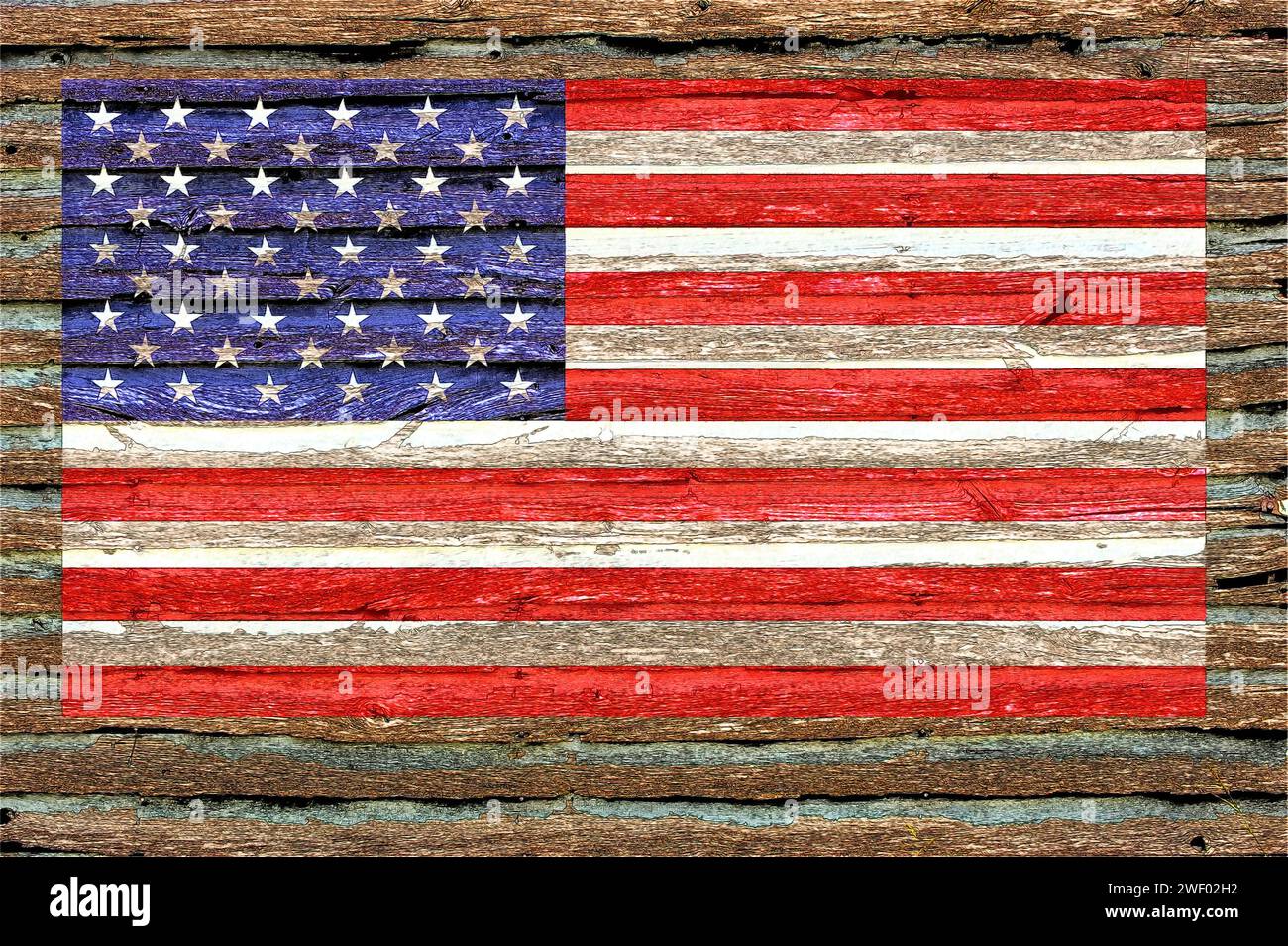 Horizontal close-up shot of an American flag on old wooden cabin siding ...