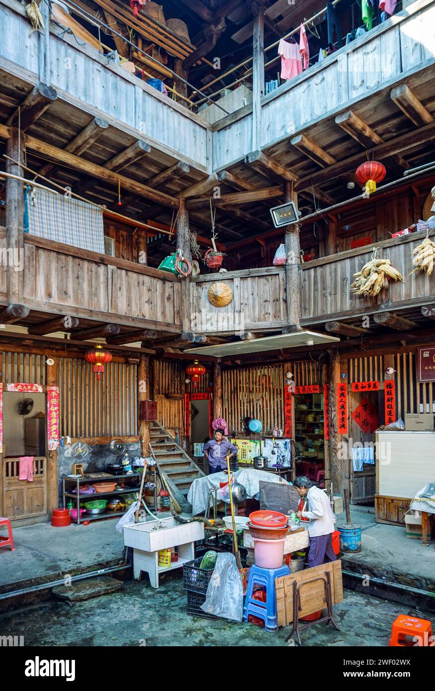 Rectangular and round Hakka Tulou (building made of rammed earth and ...