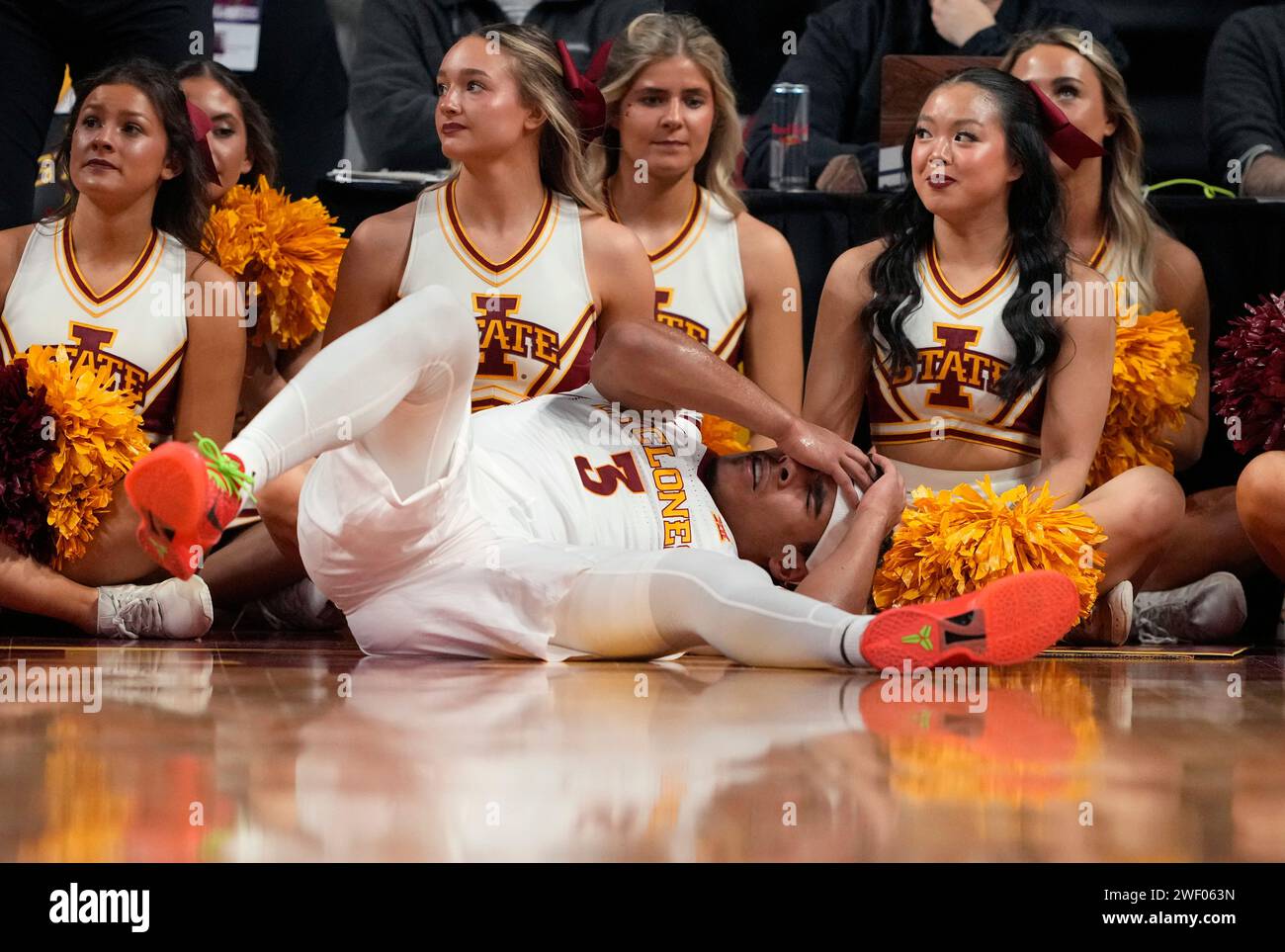 Iowa State guard Tamin Lipsey (3) holds his head after receiving a foul ...