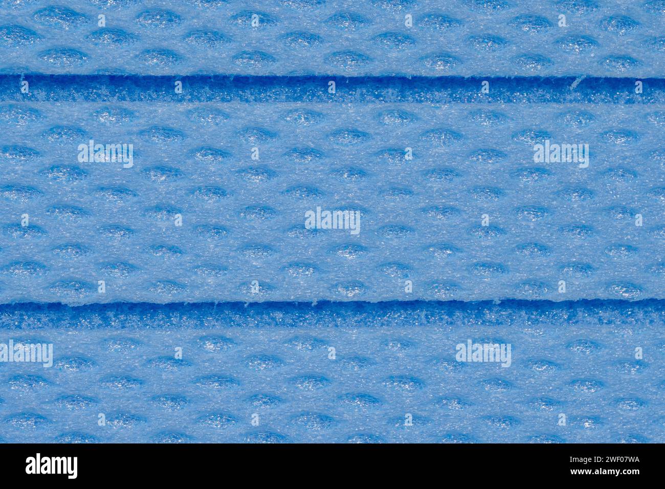 The texture of the blue XPS foam board, showcasing its material ...