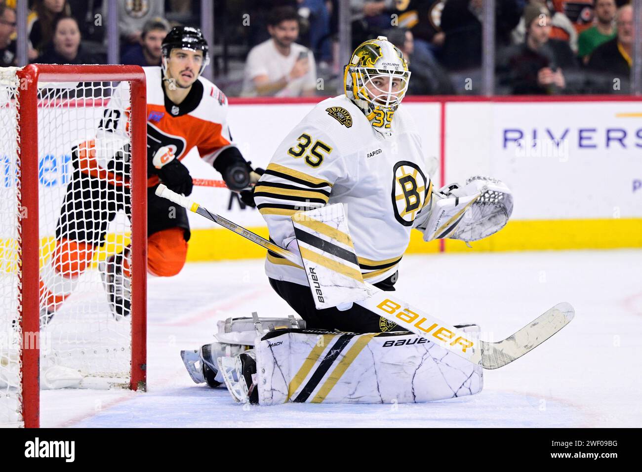 Boston Bruins goaltender Linus Ullmark watches the puck after making a ...