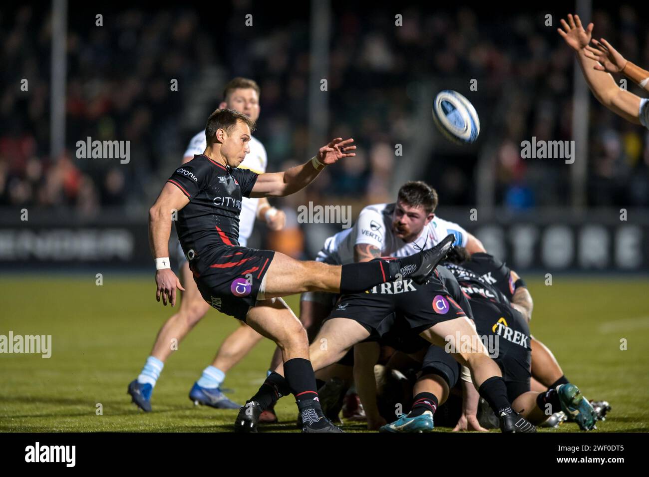 Ivan Van Zyl of Saracens kicks to clear during the Gallagher ...