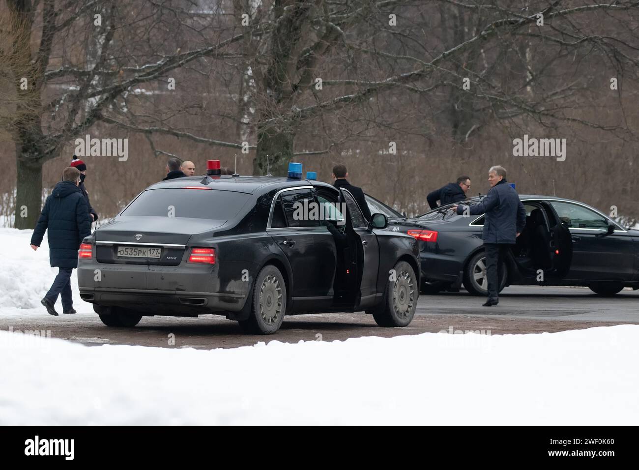 The motorcade and escort vehicles of Russian President Vladimir Putin ...