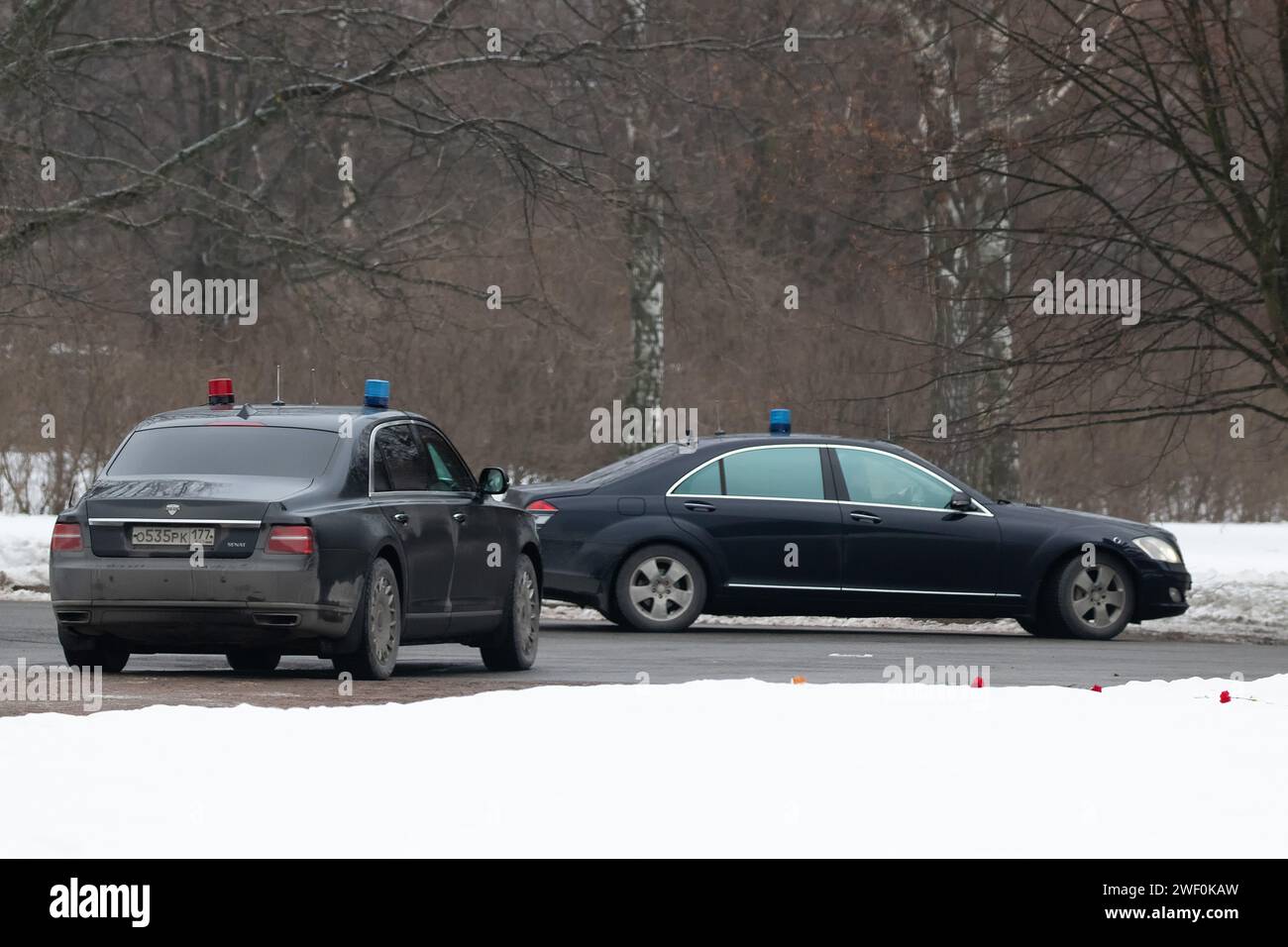 The motorcade and escort vehicles of Russian President Vladimir Putin ...