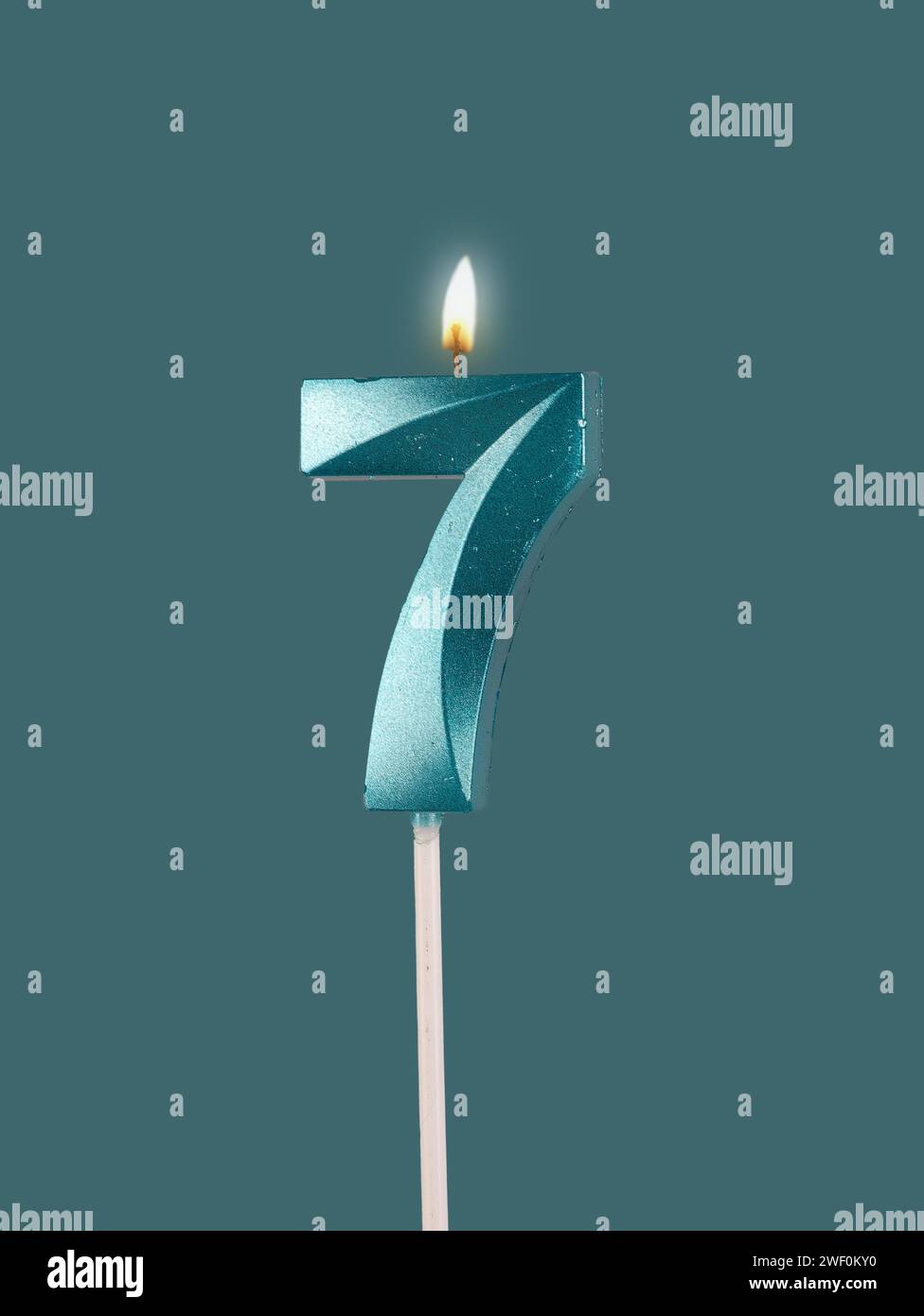 7 birthday, number candles with light, isolated on white background ...