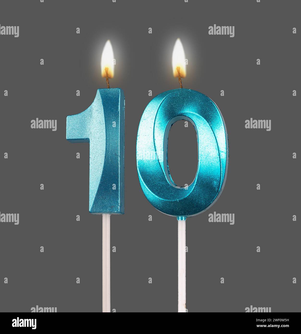 10 birthday, number candles with light, isolated on white background ...