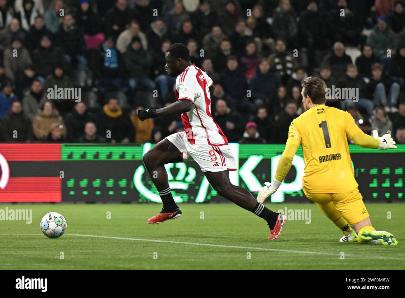 ALMELO - (l-r) Brian Brobbey of Ajax, Heracles Almelo goalkeeper ...