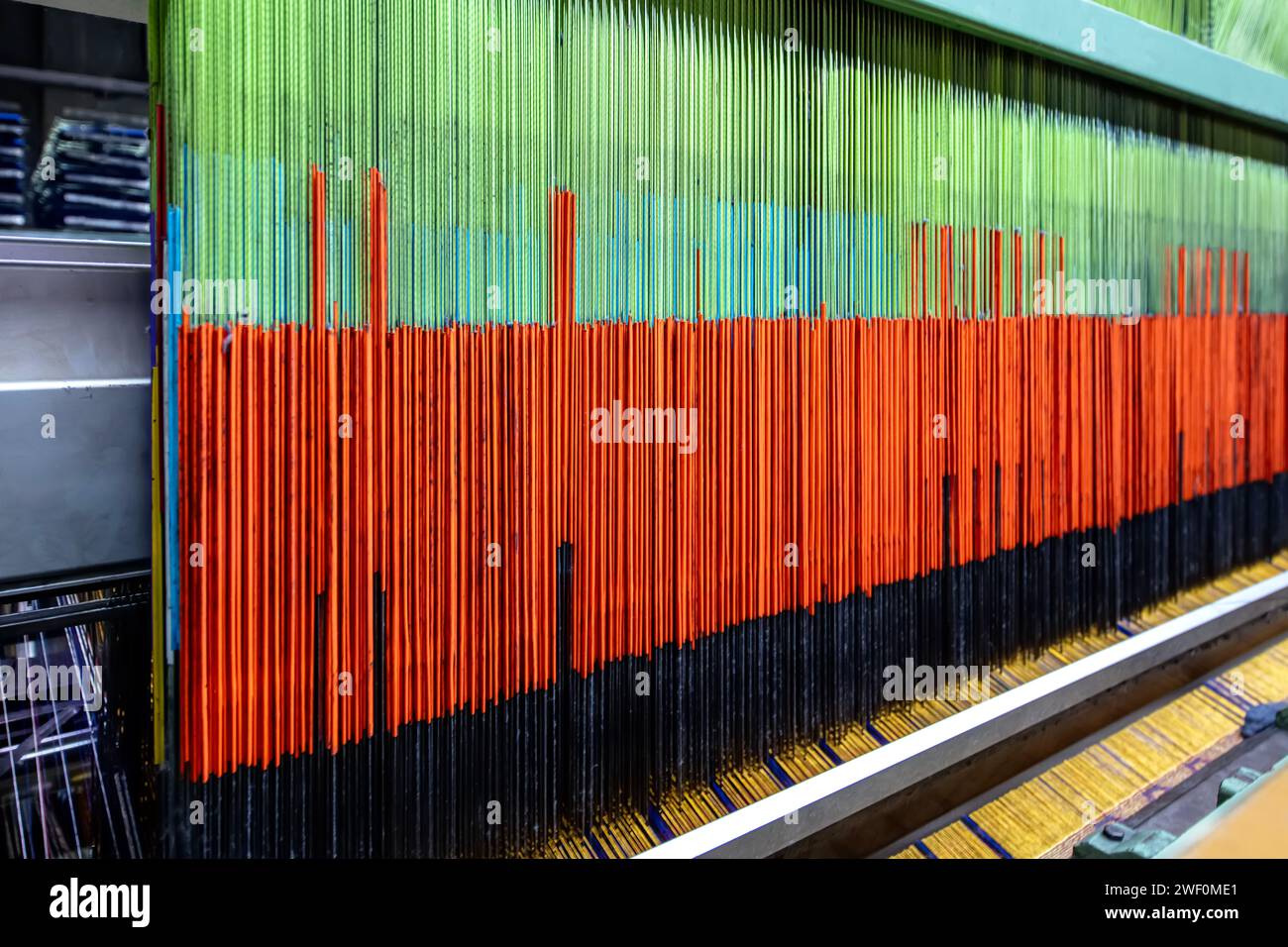 Modern Carpet weaving factory. Carpet making machine needle. Yarn ...