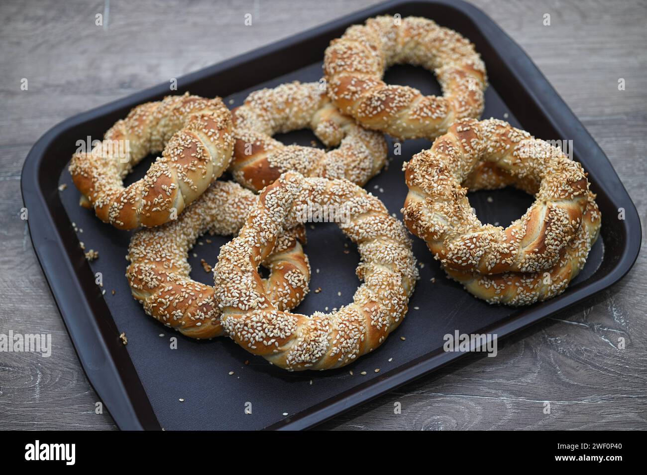 homemade Turkish bagels - simit with sesame seeds 3 Stock Photo - Alamy