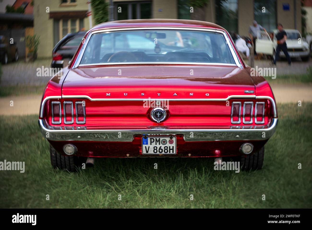 WERDER (HAVEL), GERMANY - MAY 20, 2023: The muscle car Ford Mustang, 1968. Swirl bokeh, art lens ...