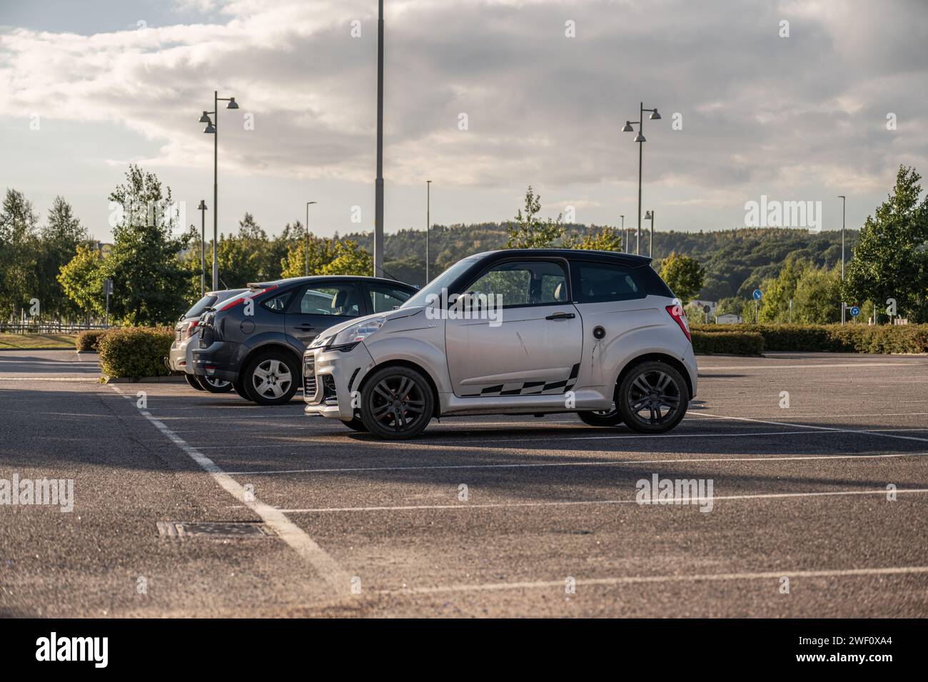 Kungsbacka, Sweden - september 11 2022: Tiny white Lieger moped car in ...