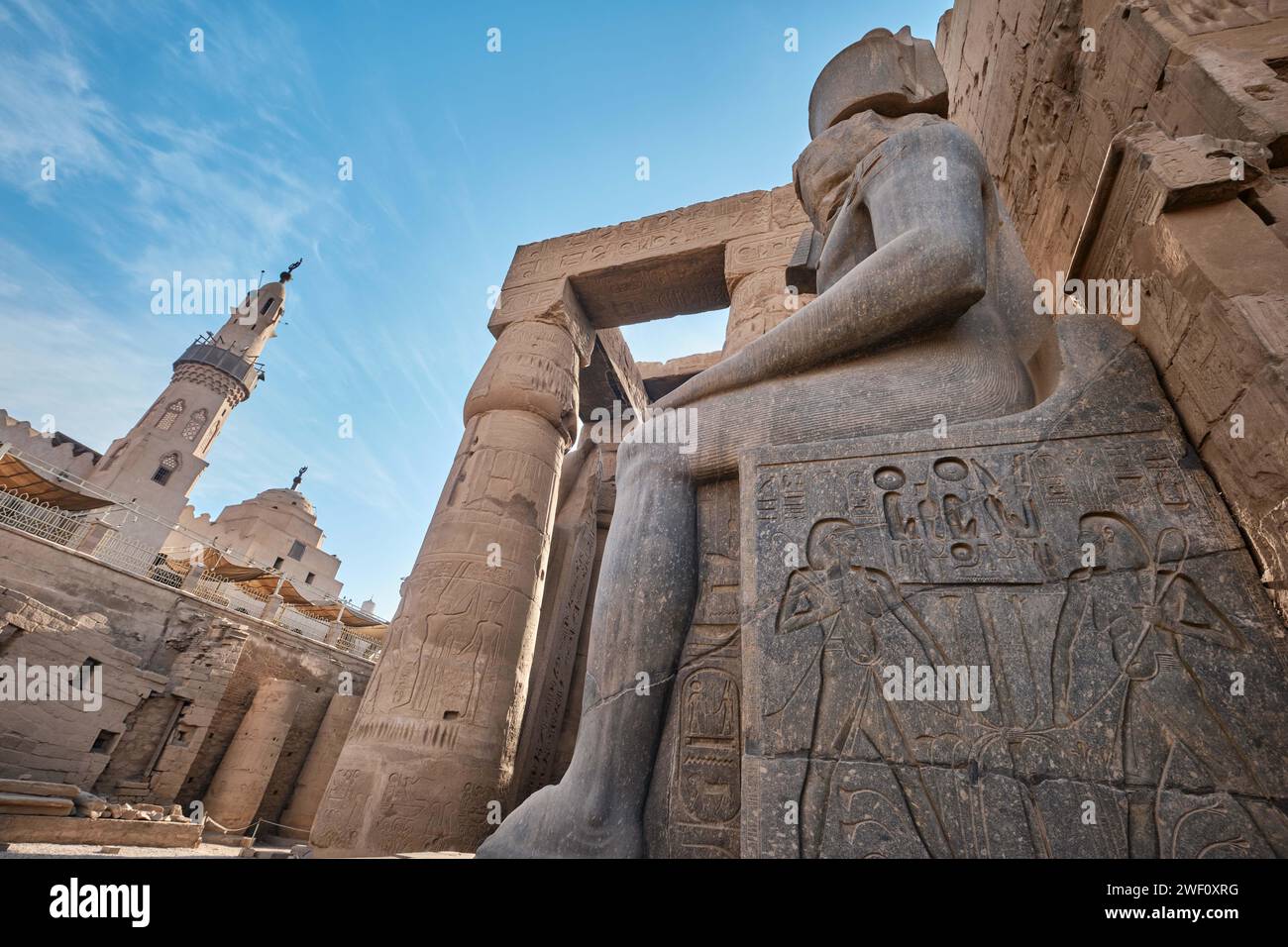 Luxor, Egypt - December 26 2023: Statue of Ramesses II and Mosque of ...