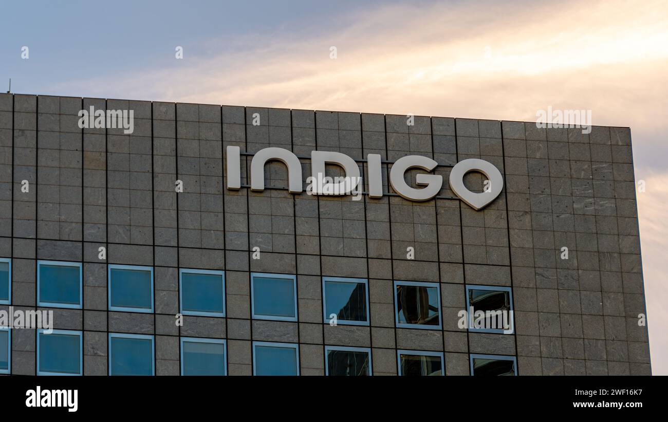 Sign and logo on the Indigo headquarters building. Indigo Group (formerly Vinci Park) is a ...