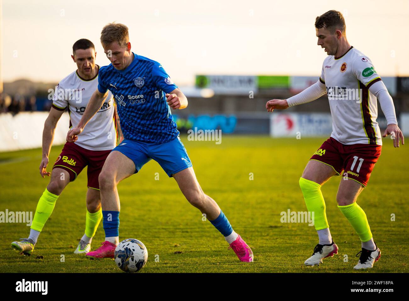 Peterhead, Scotland. 27 January 2024. Ross Meechan (2 - Stenhousemuir) and Adam Brown (11 ...