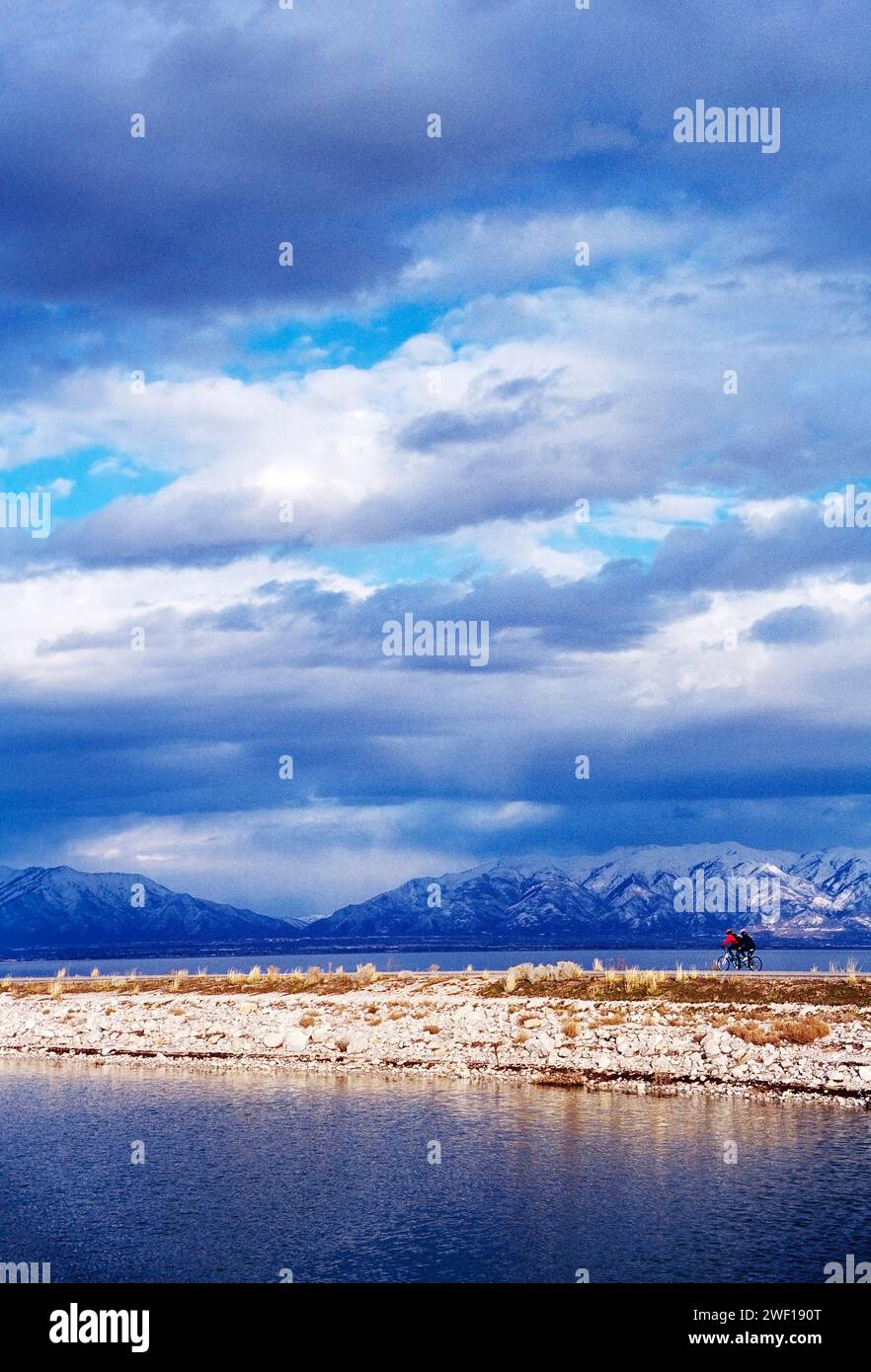 Tandem cyclists on access road across Great Salt Lake to Antelope ...