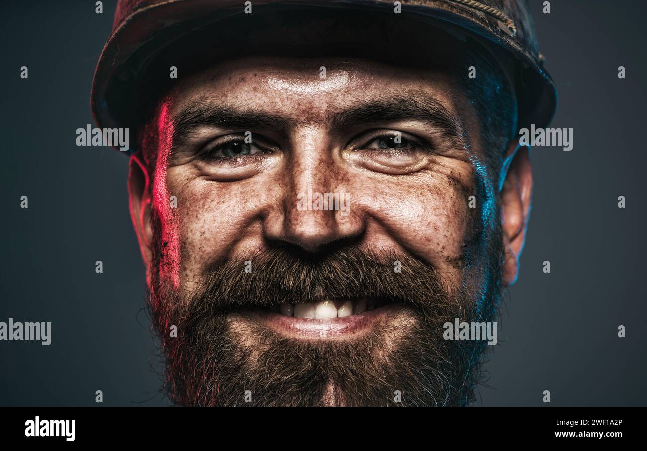 Closeup portrait smiling handsome engineer, architect or builder in ...