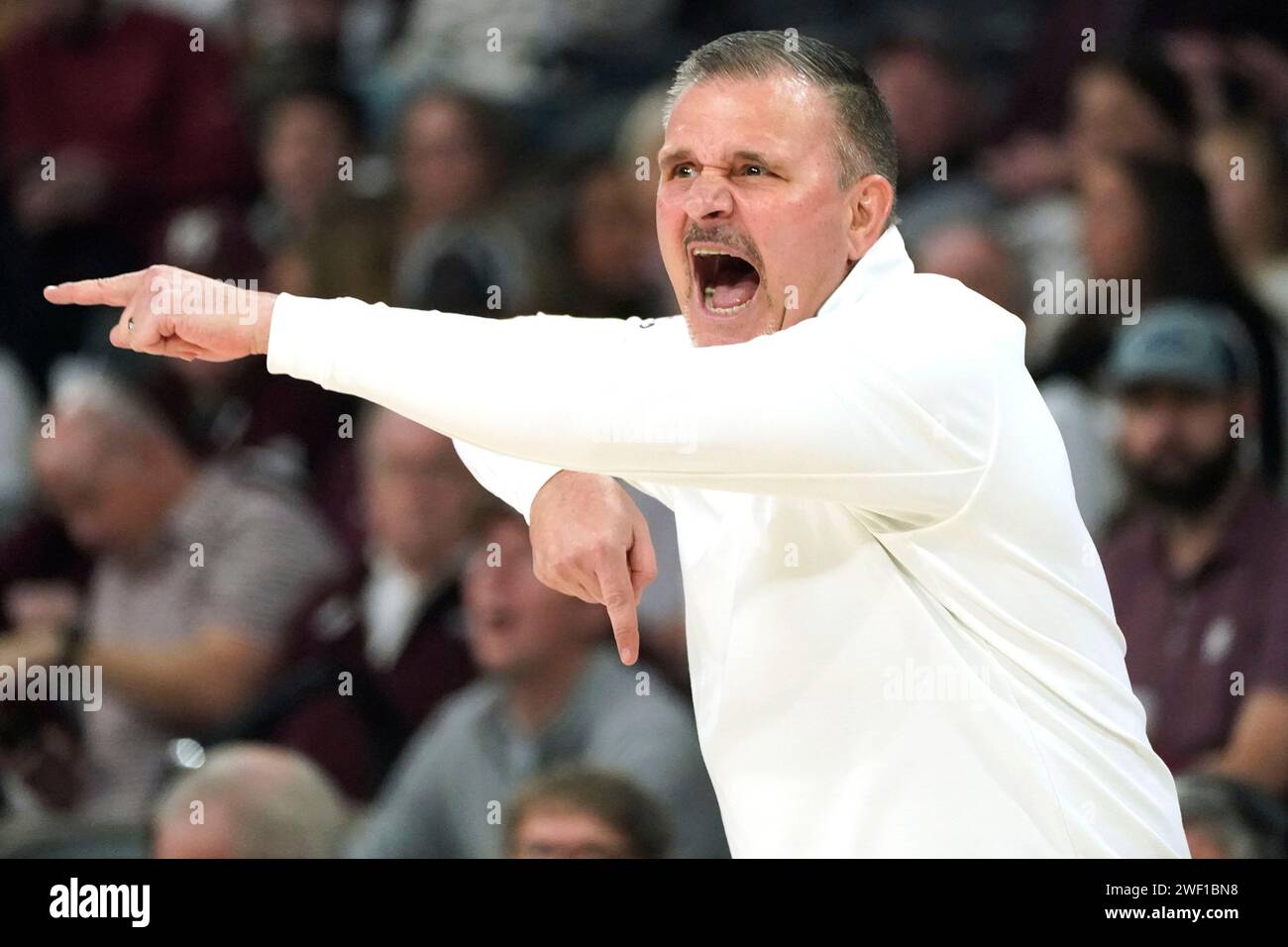 Mississippi State head coach Chris Jans call out to his players during ...