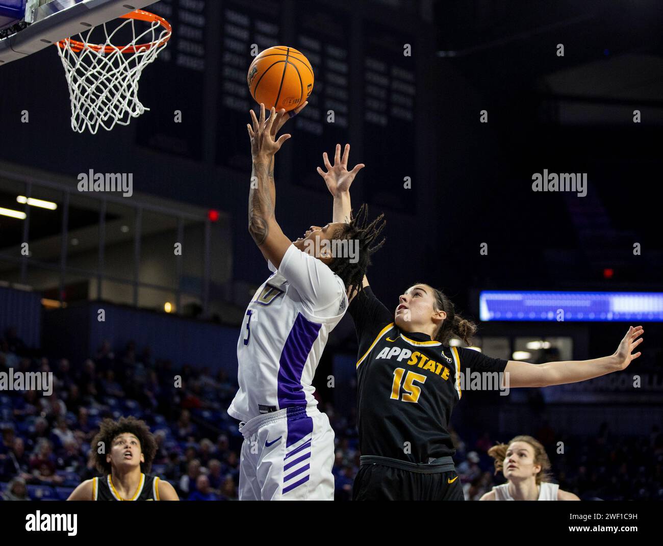 James Madison guard Hevynne Bristow (3) shoots next to Appalachian ...