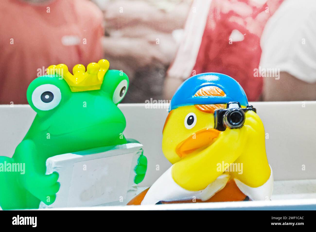 cute rubber toy frog and duck on display in a supermarket Stock Photo ...