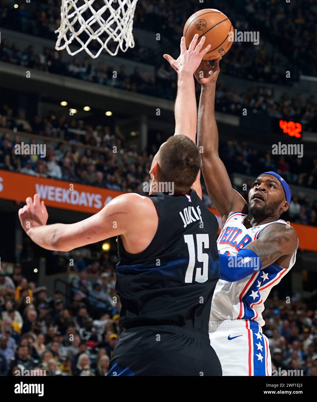 Philadelphia 76ers forward Paul Reed, right, shoots for a basket over ...
