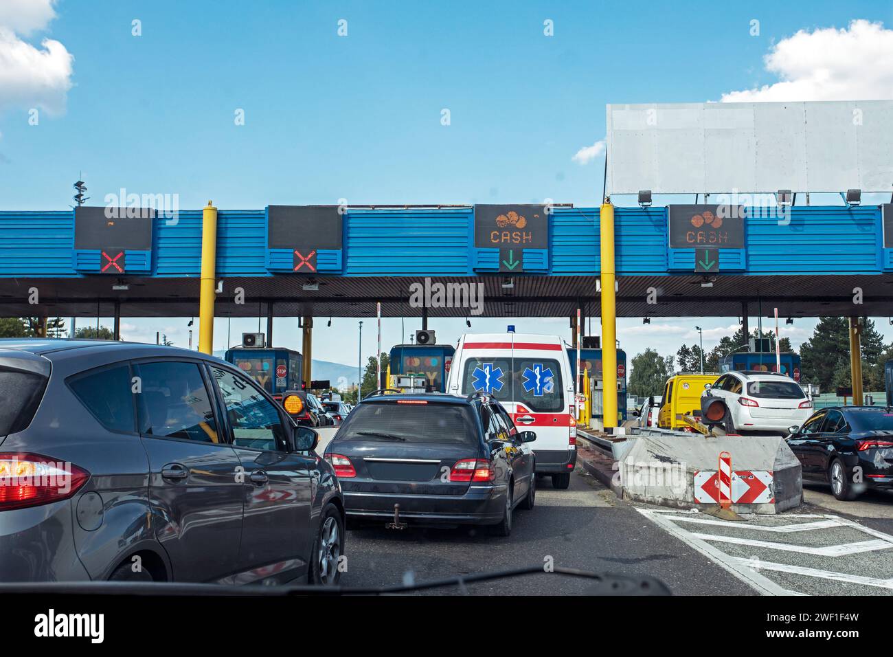 traffic jam on a toll road in Europe on a sunny day. Travelling by car ...