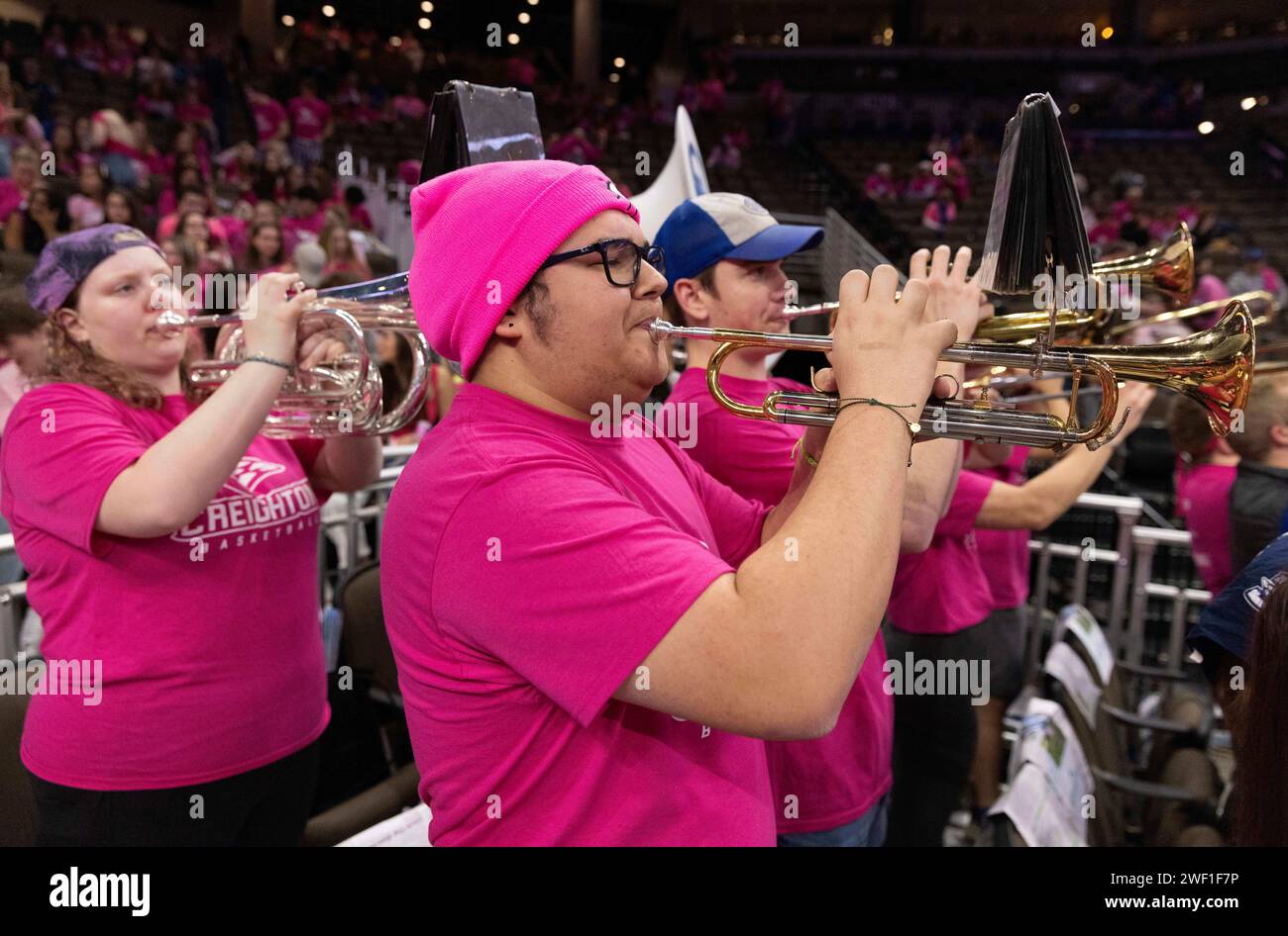 Creighton junior Kevin Diver, front, of Chicago plays trumpet with the ...