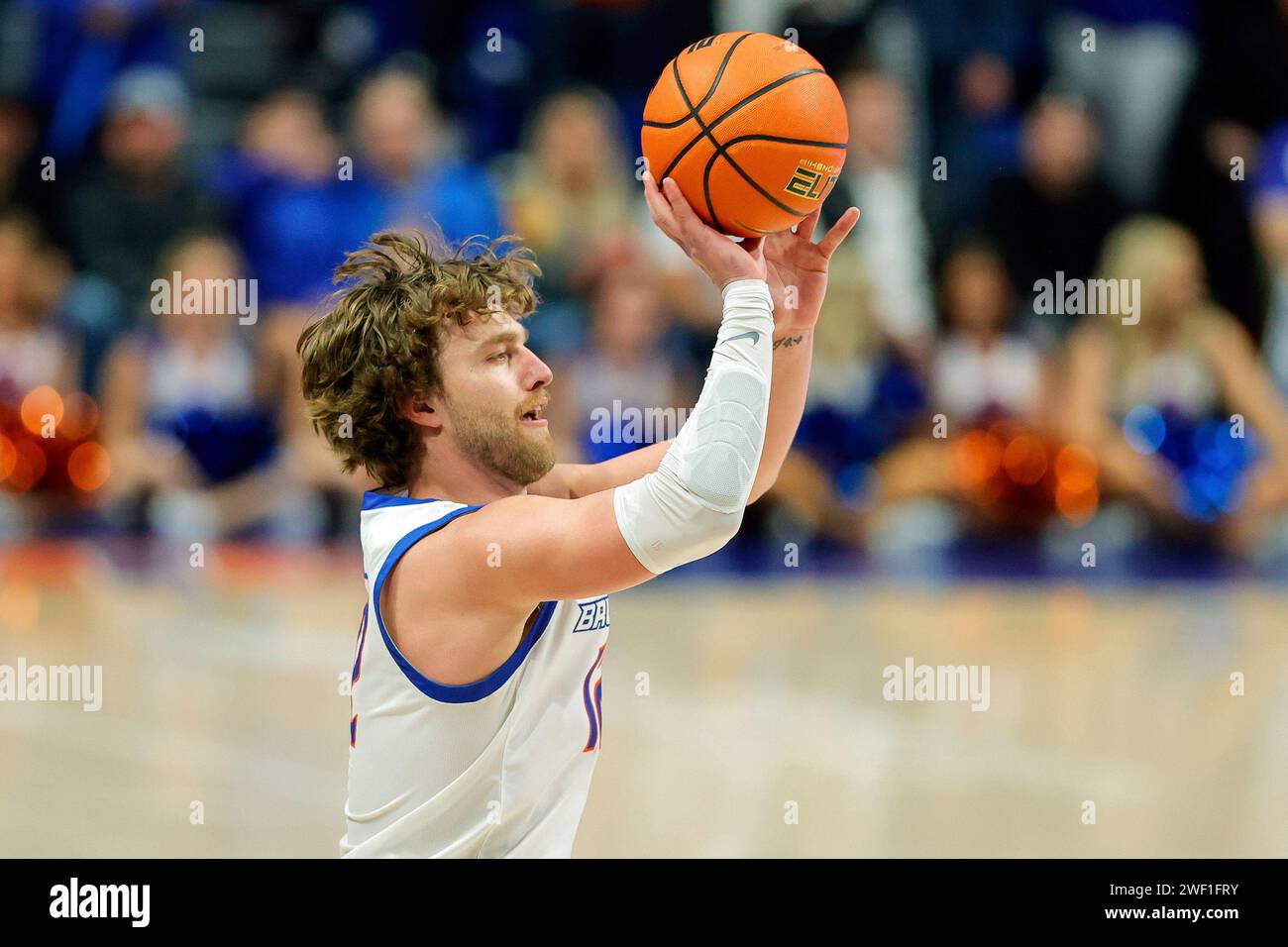 Boise State guard Max Rice (12) puts up a 3 point shot against Utah ...