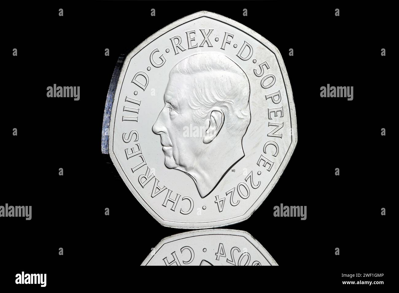 2024 50 pence coin showing the first coin portrait of King Charles III ...