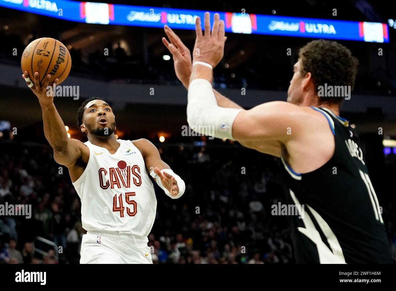Cleveland Cavaliers' Donovan Mitchell (45) shoots against Milwaukee ...