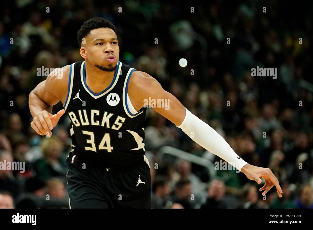 Milwaukee Bucks' Giannis Antetokounmpo goes through his pregame routine ...