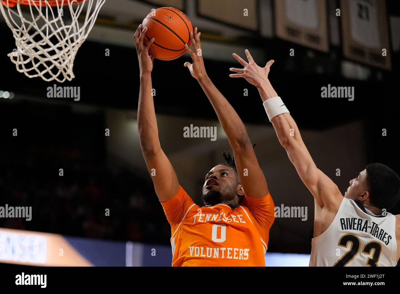 Tennessee forward Jonas Aidoo (0) shoots a basket past Vanderbilt guard ...